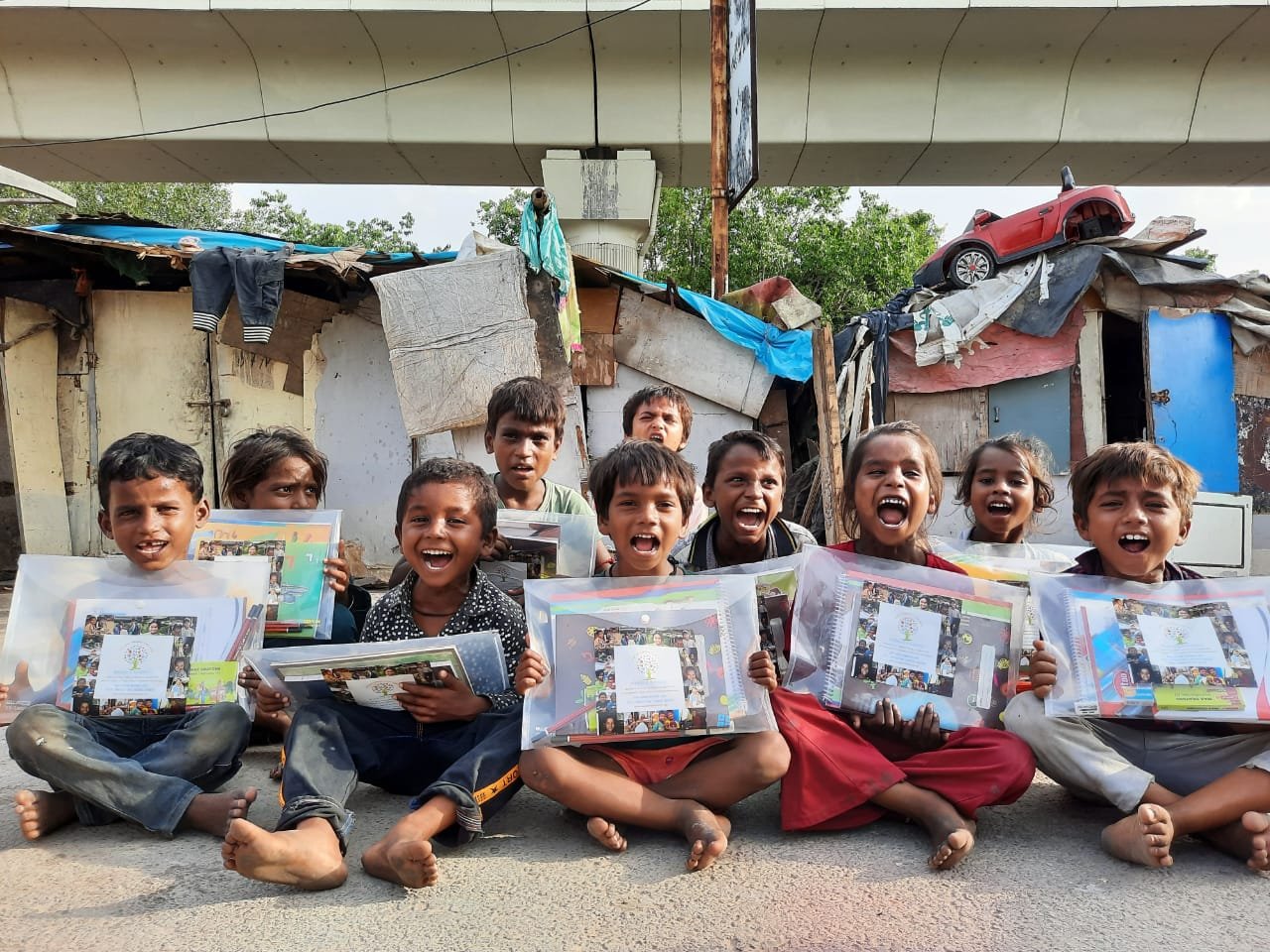 A NGO Distributing Stationery Kits to Underprivileged Children in Delhi ...